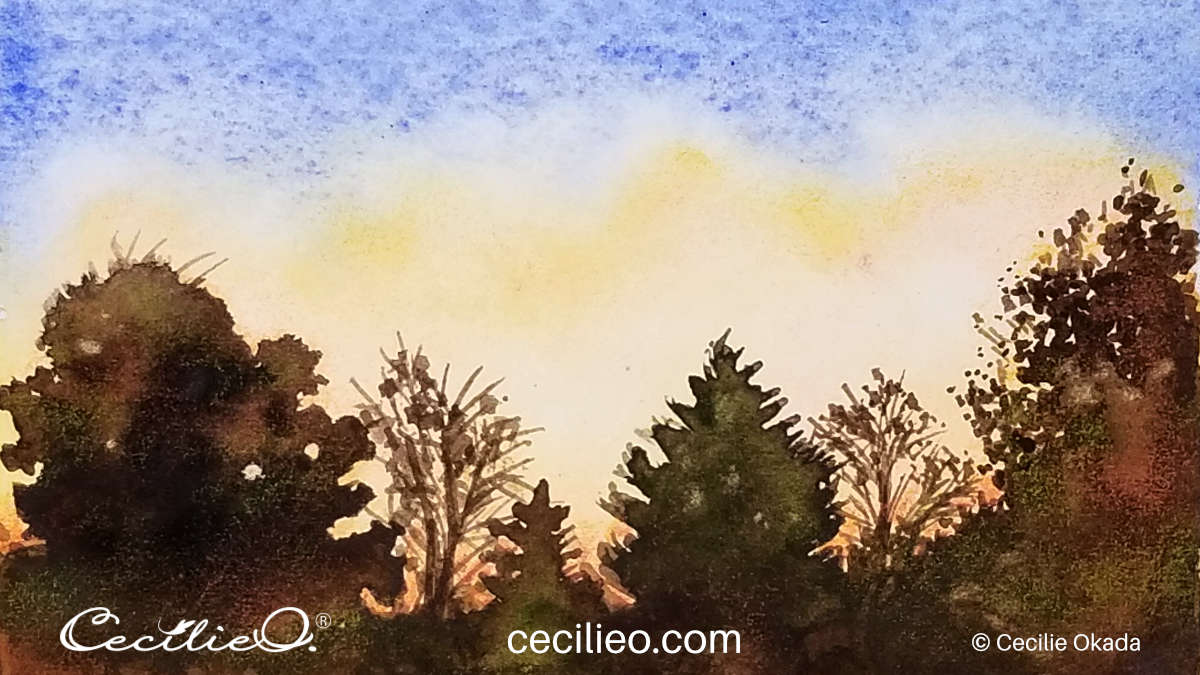 How to Paint a Golden Watercolor Sunset With Silhouette Trees